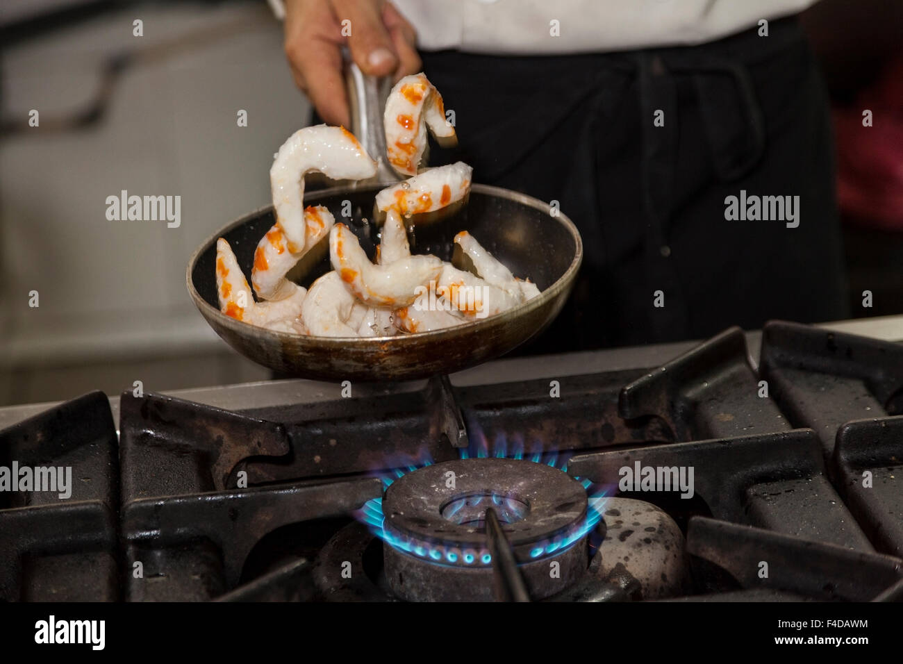 Chef tossing flame hi-res stock photography and images - Alamy