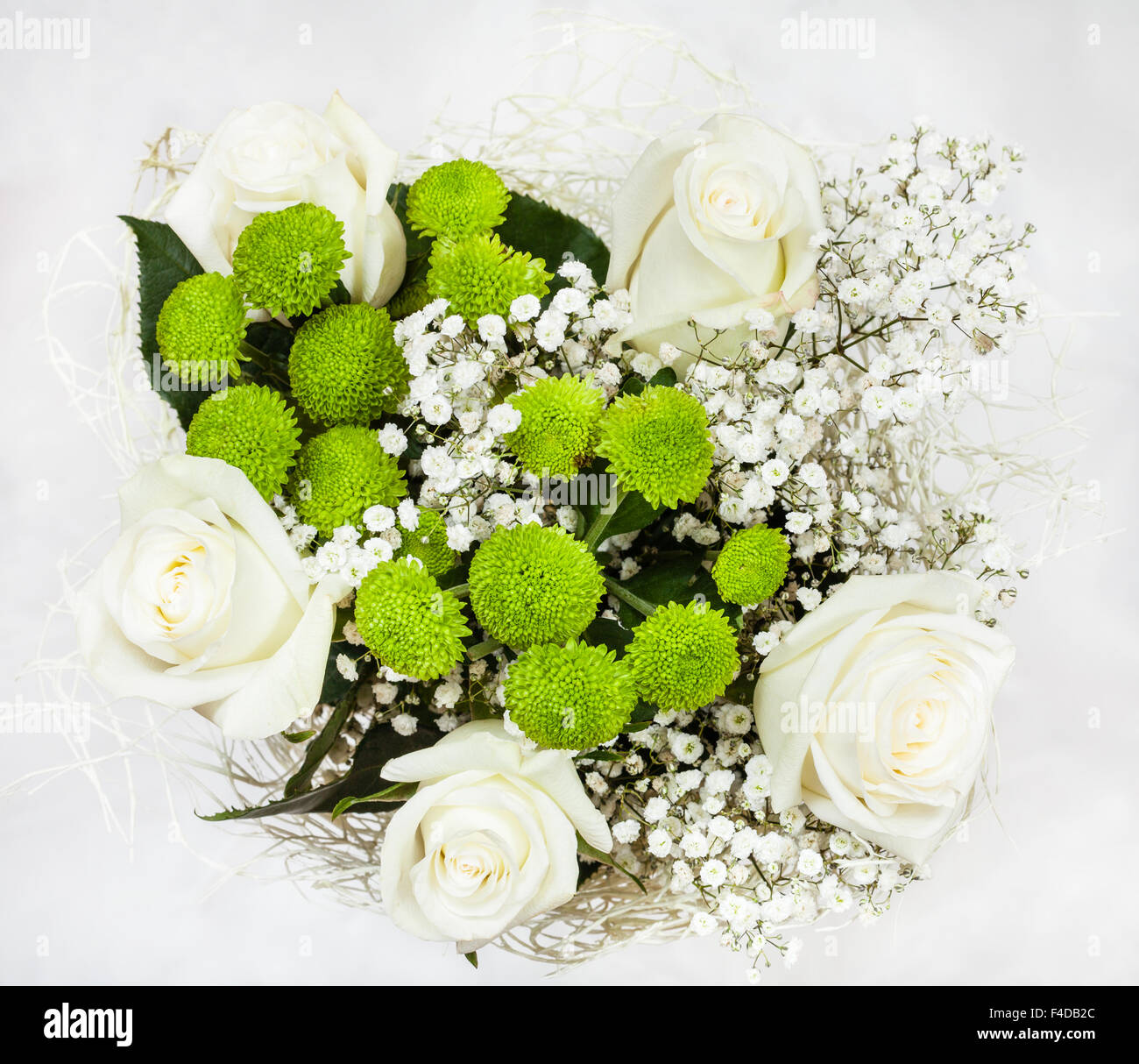 top view of bouquet with white rose flowers on white Stock Photo - Alamy