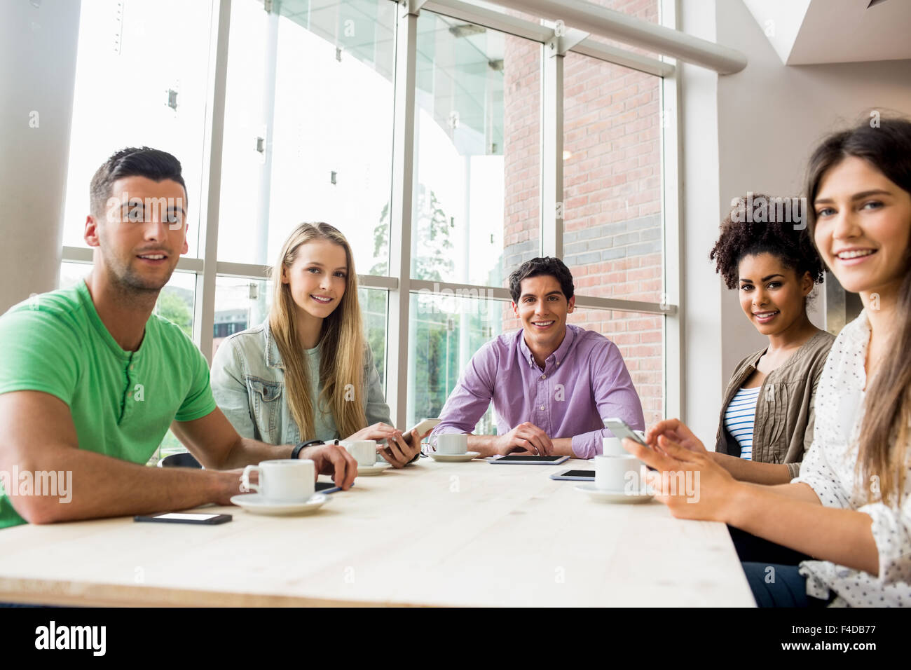 Students working together on an assignment Stock Photo - Alamy