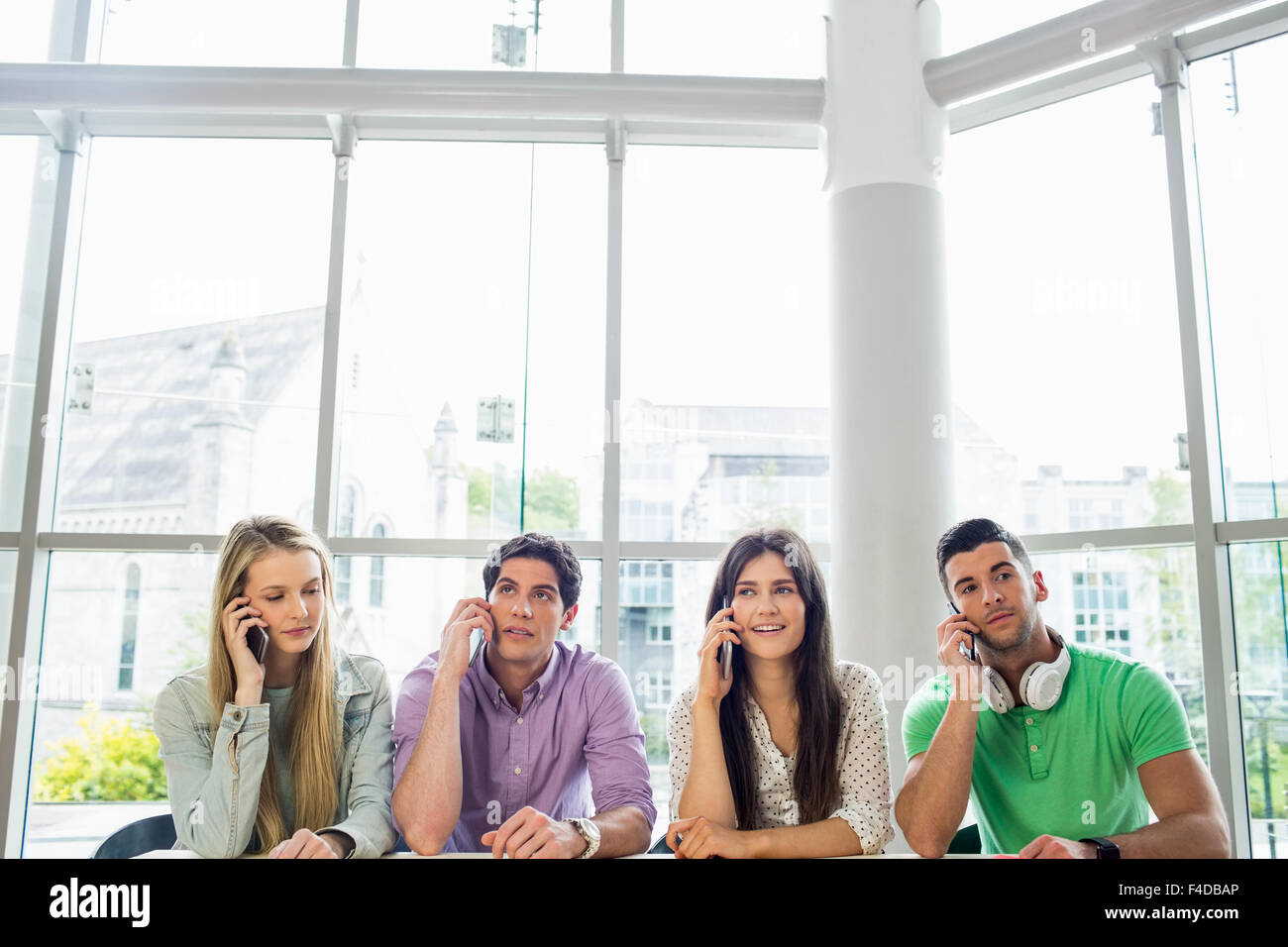 Students talking on their phones Stock Photo - Alamy