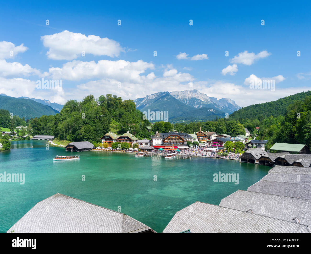The jetty of schoenau village with the roofs of the traditional wooden ...