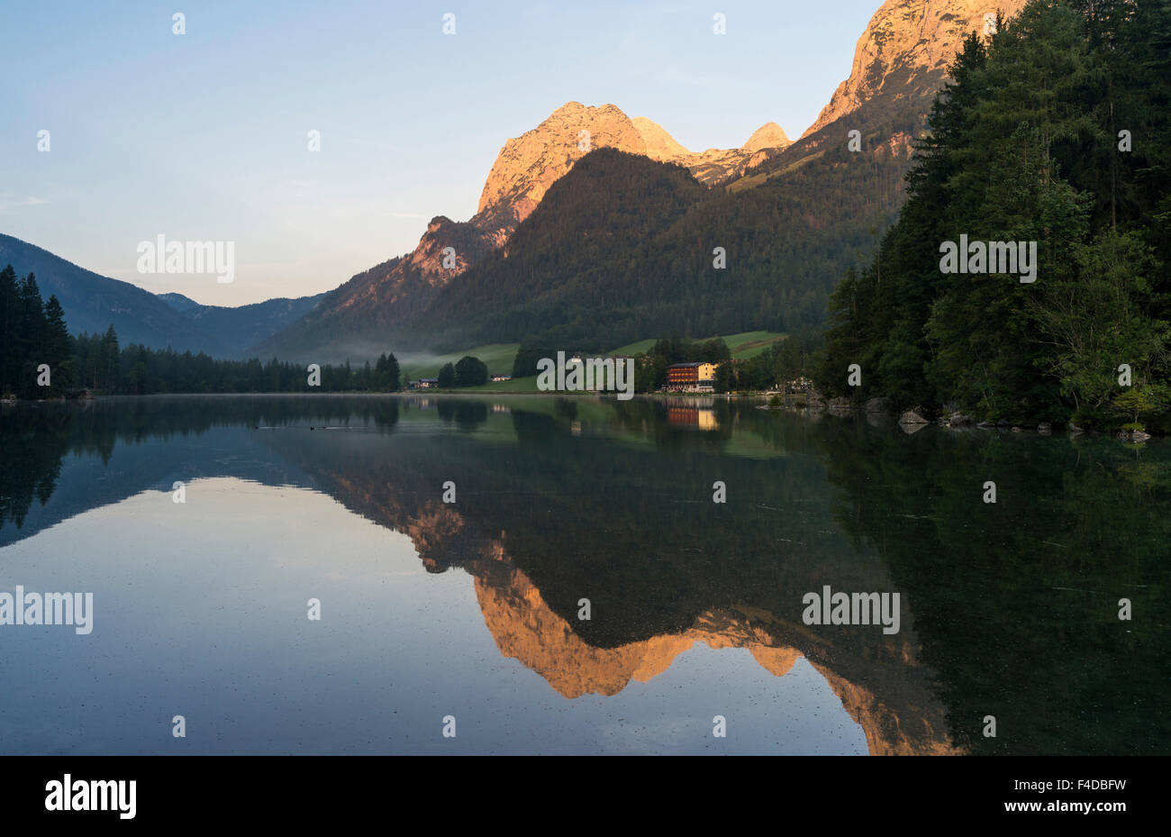 The romantic lake Hintersee , sunrise with Reiter Alpe Mountain chain ...