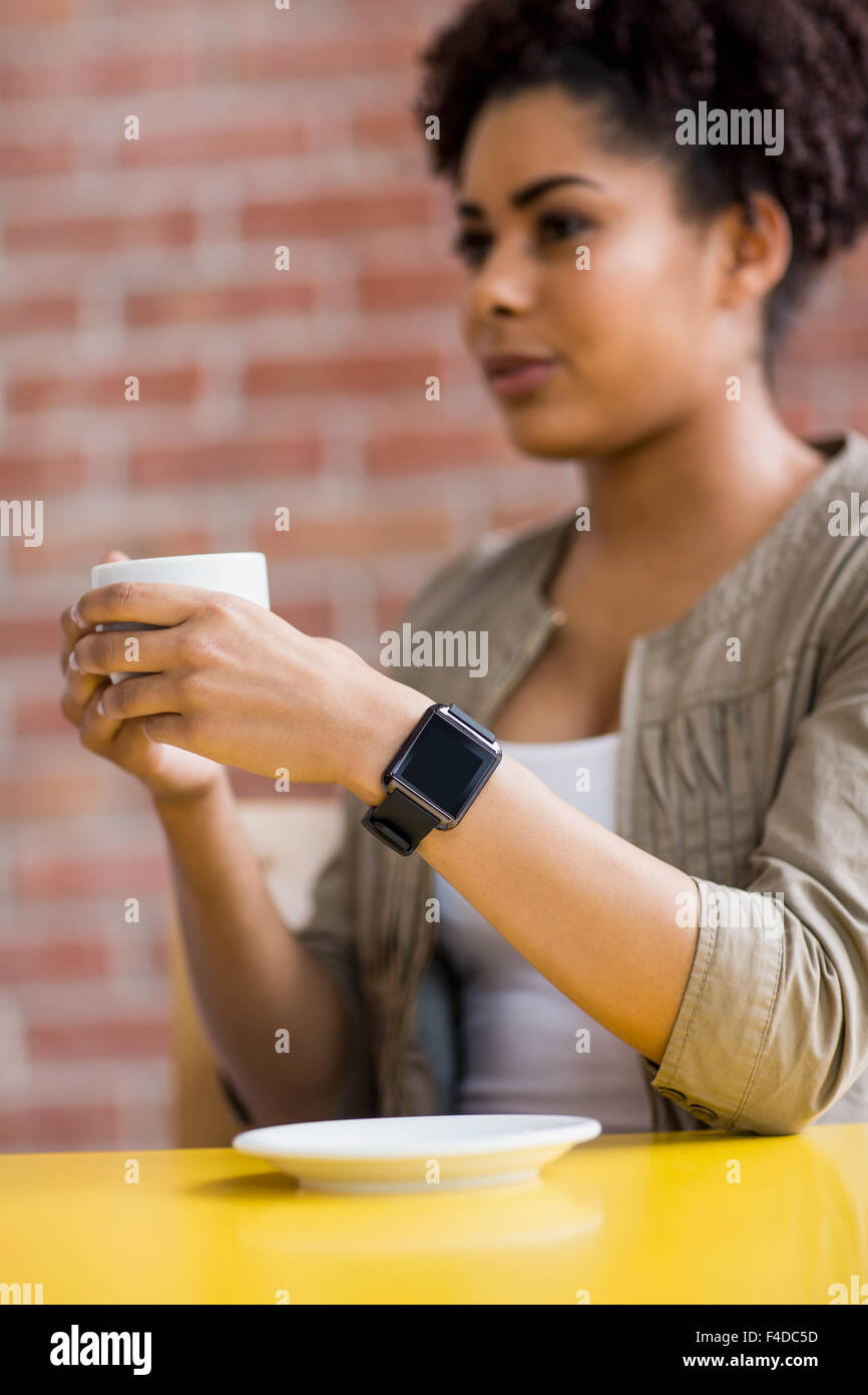 Student having a coffee in cafe Stock Photo - Alamy