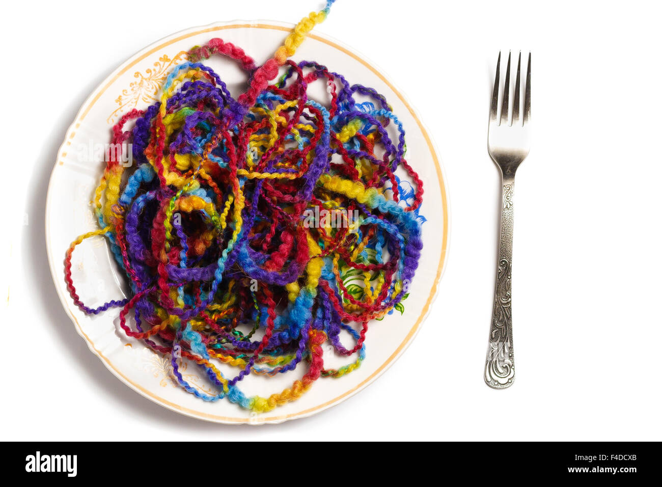 Full plate of melange yarn on white background Stock Photo - Alamy