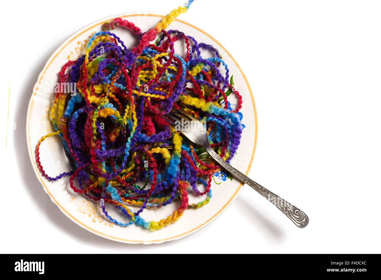 Full plate of melange yarn on white background Stock Photo - Alamy