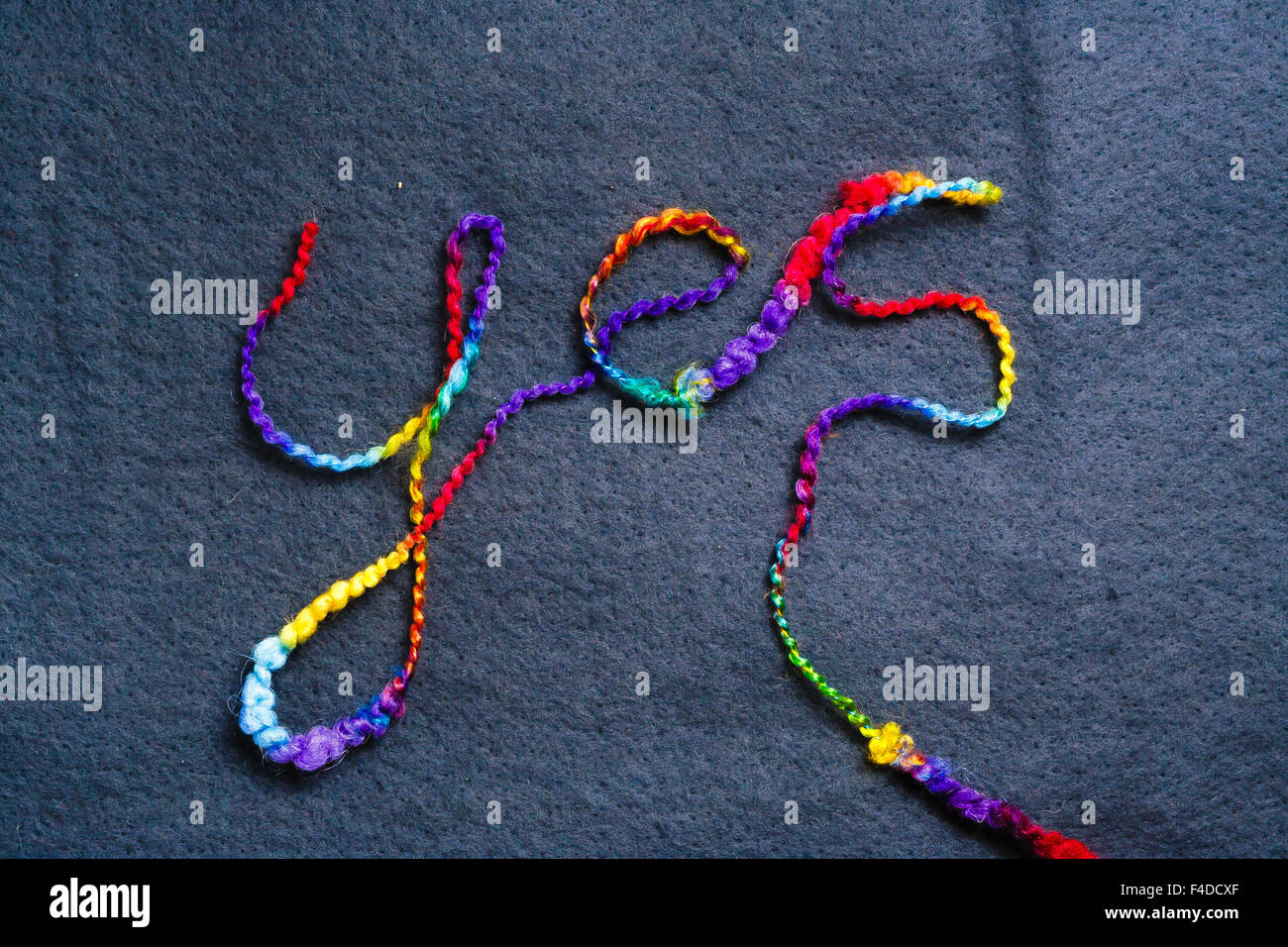 Melange yarn yes on wool texture background Stock Photo - Alamy