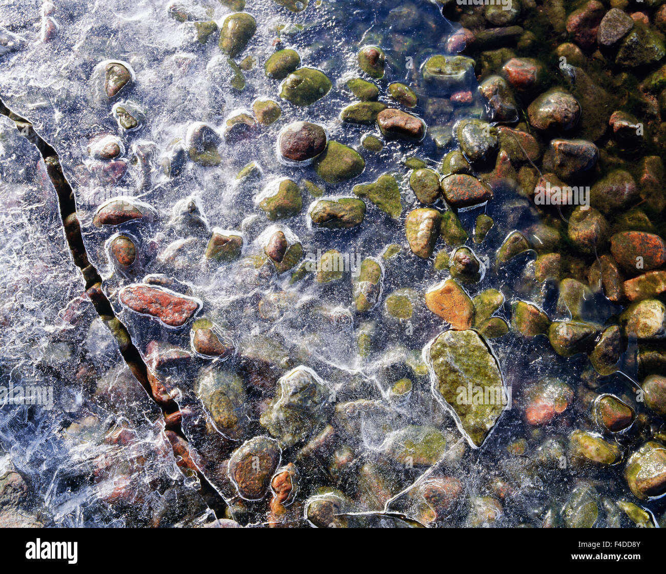 Rocks submerged in water Stock Photo - Alamy