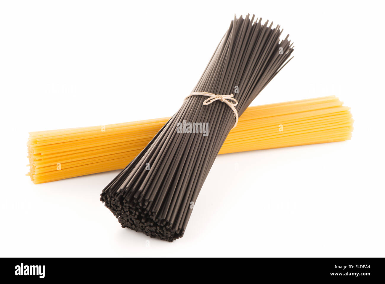 Bunch of spaghetti on white background Stock Photo - Alamy