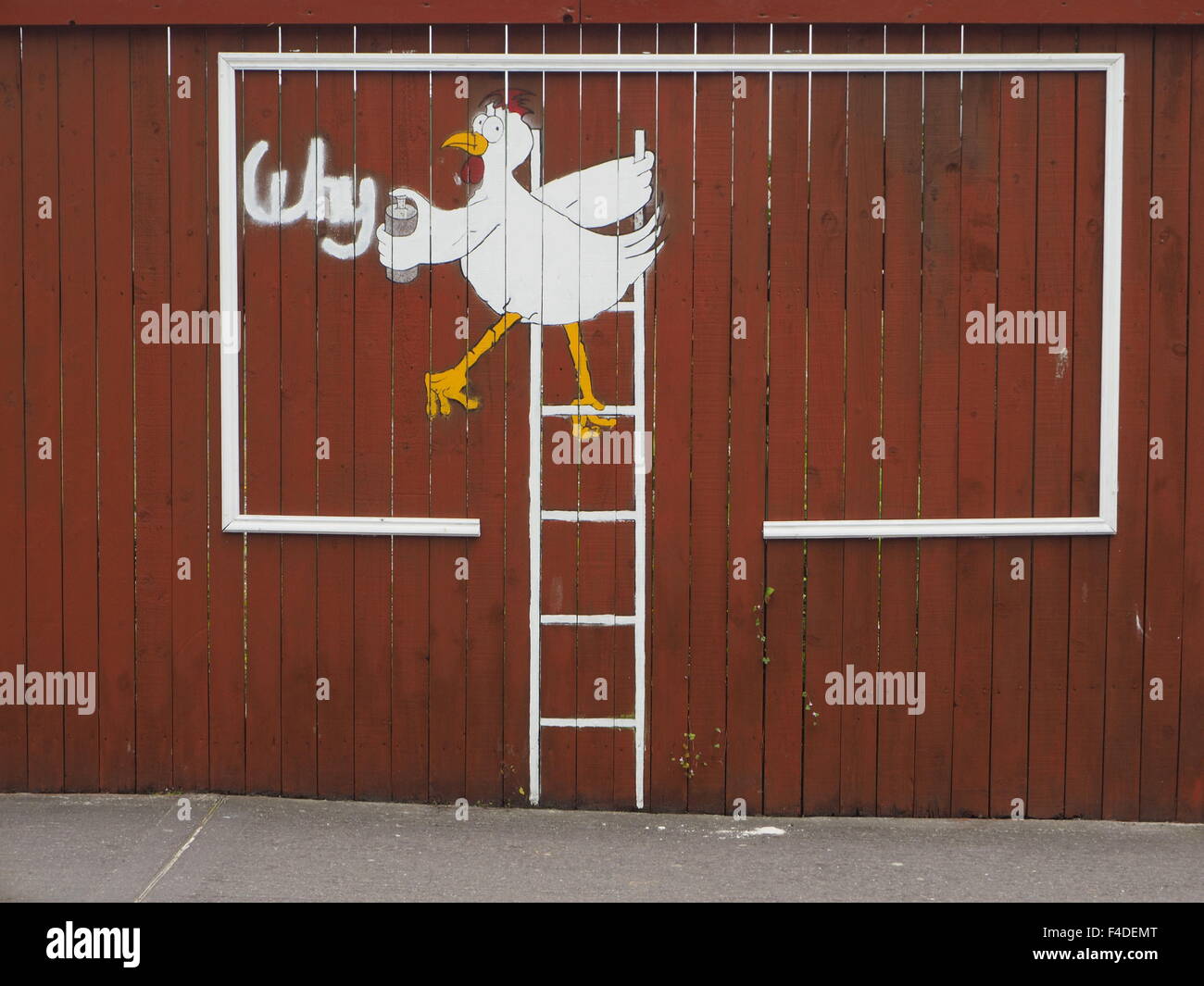 Sign showing white chicken spray-painting "Why "(did the chicken cross ...