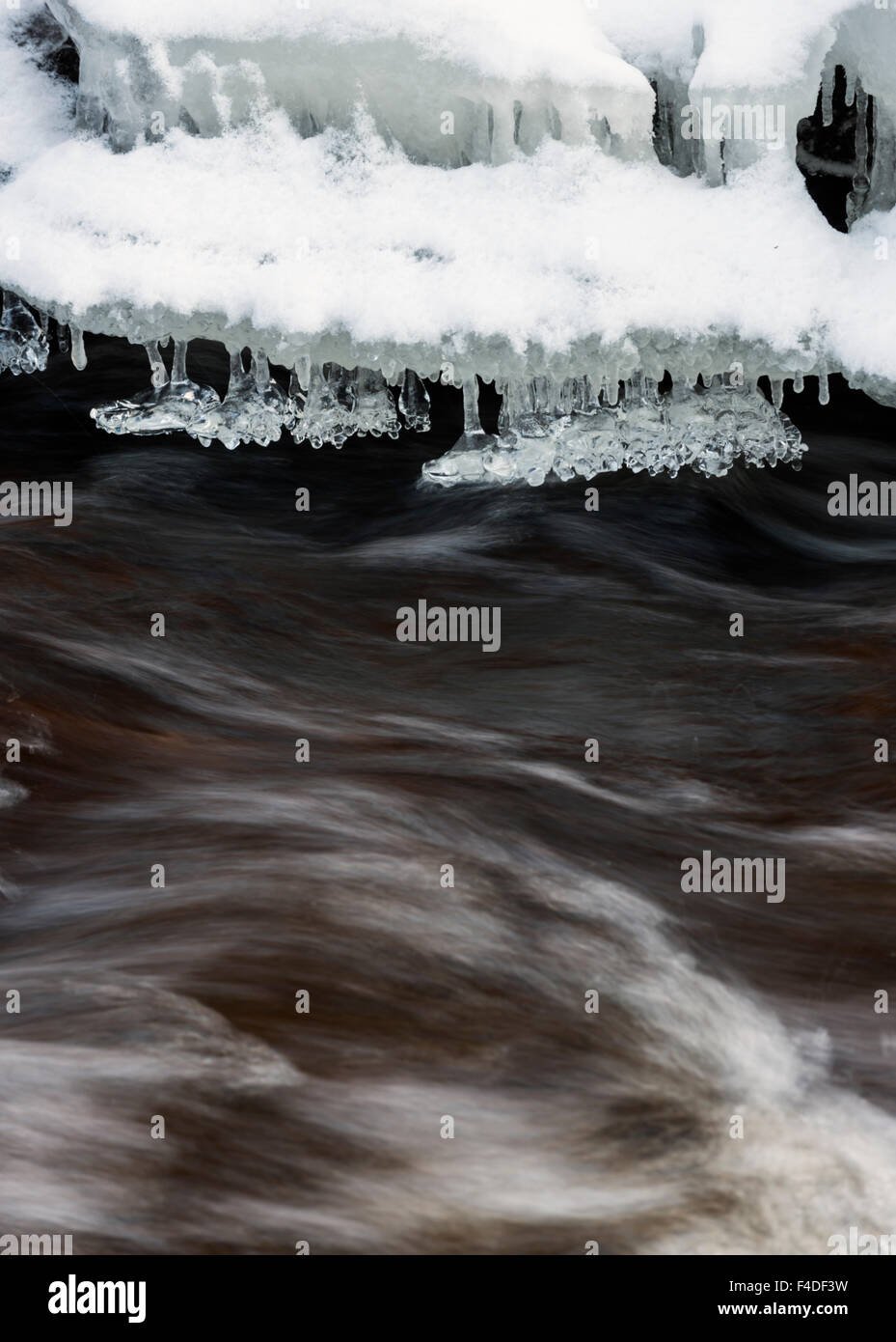 Ice formation at small creek Stock Photo - Alamy