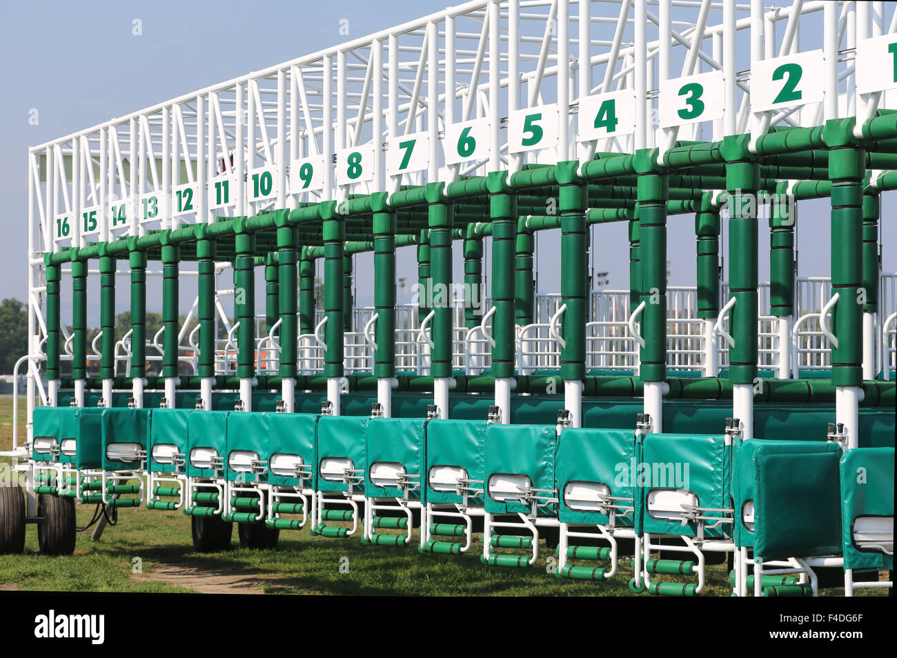 Horse track with starting gates at a race track summertime Stock Photo ...