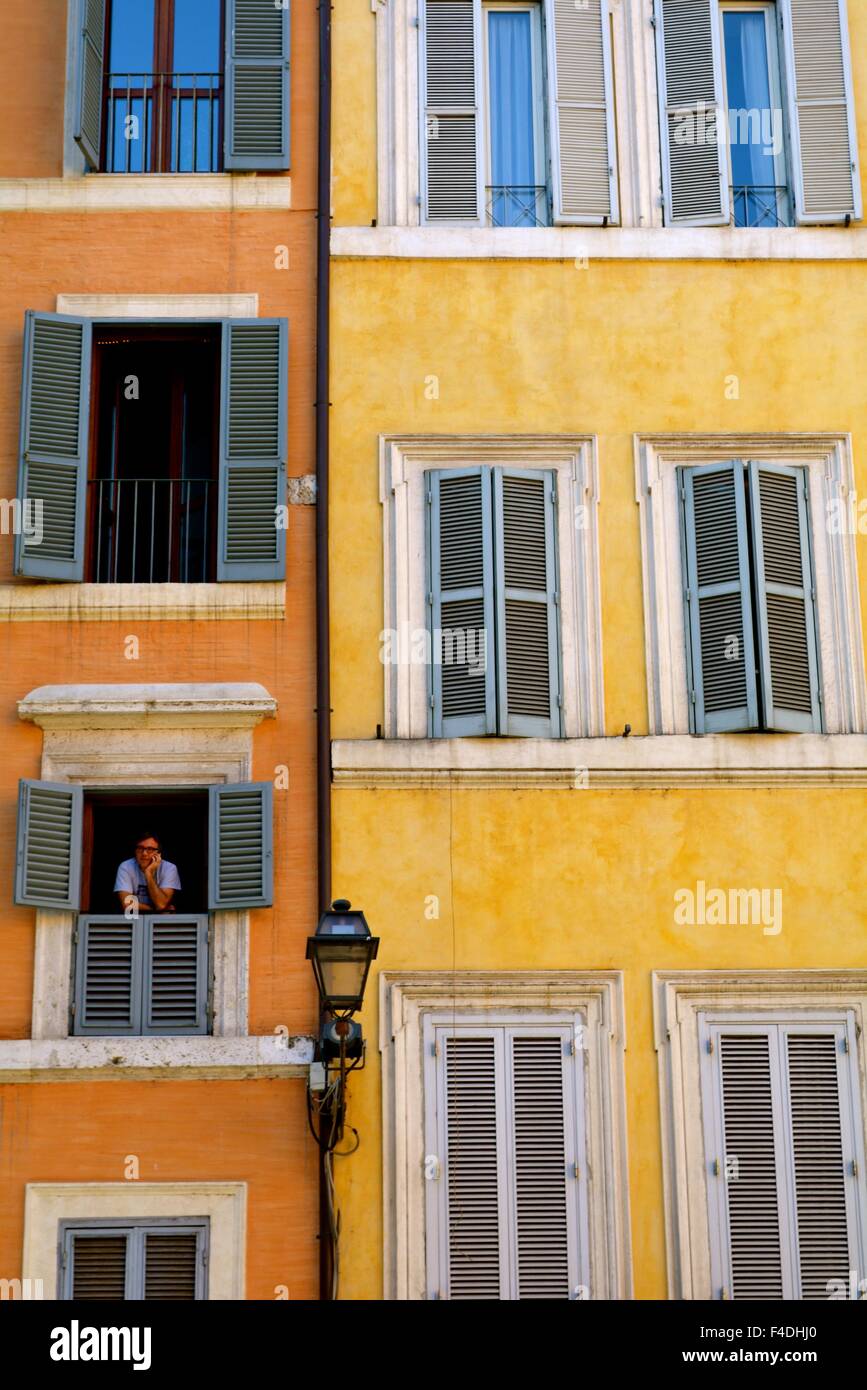 Person looking out window rome hi-res stock photography and images - Alamy