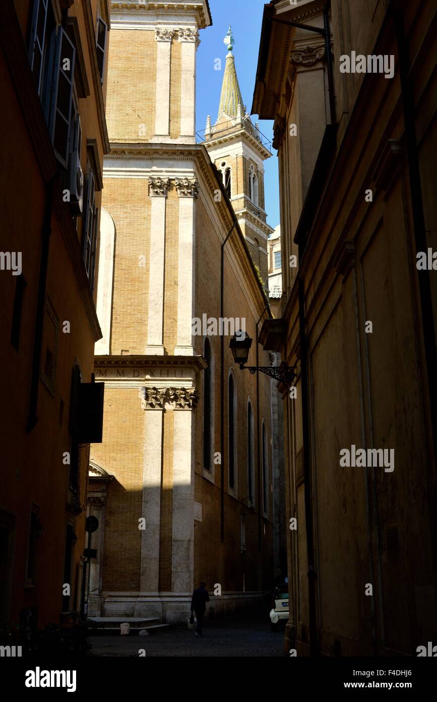 sunshine lighting up a building on the corner of piazza navona in rome ...