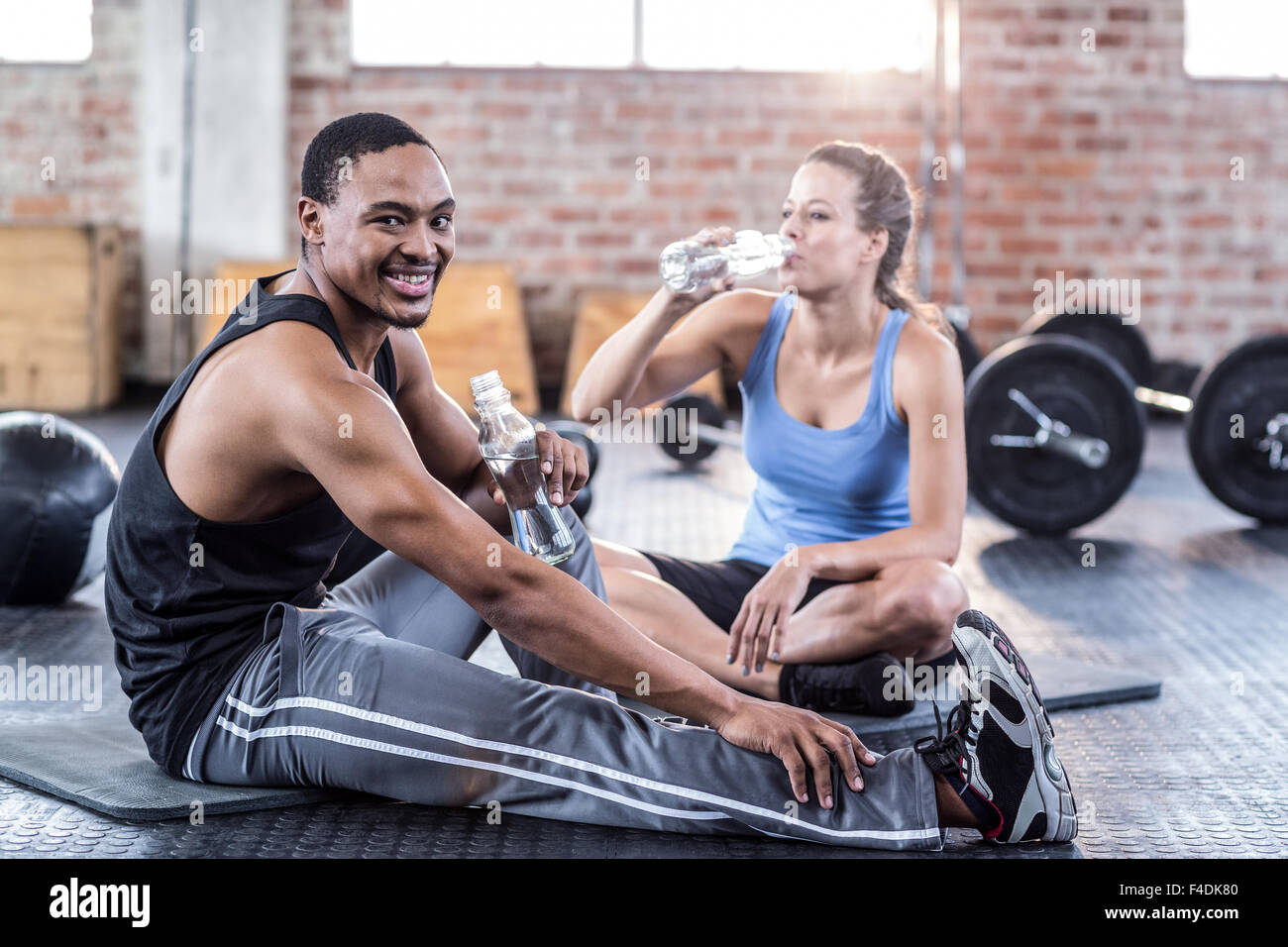 Healthy couple drinking water hi-res stock photography and images - Alamy