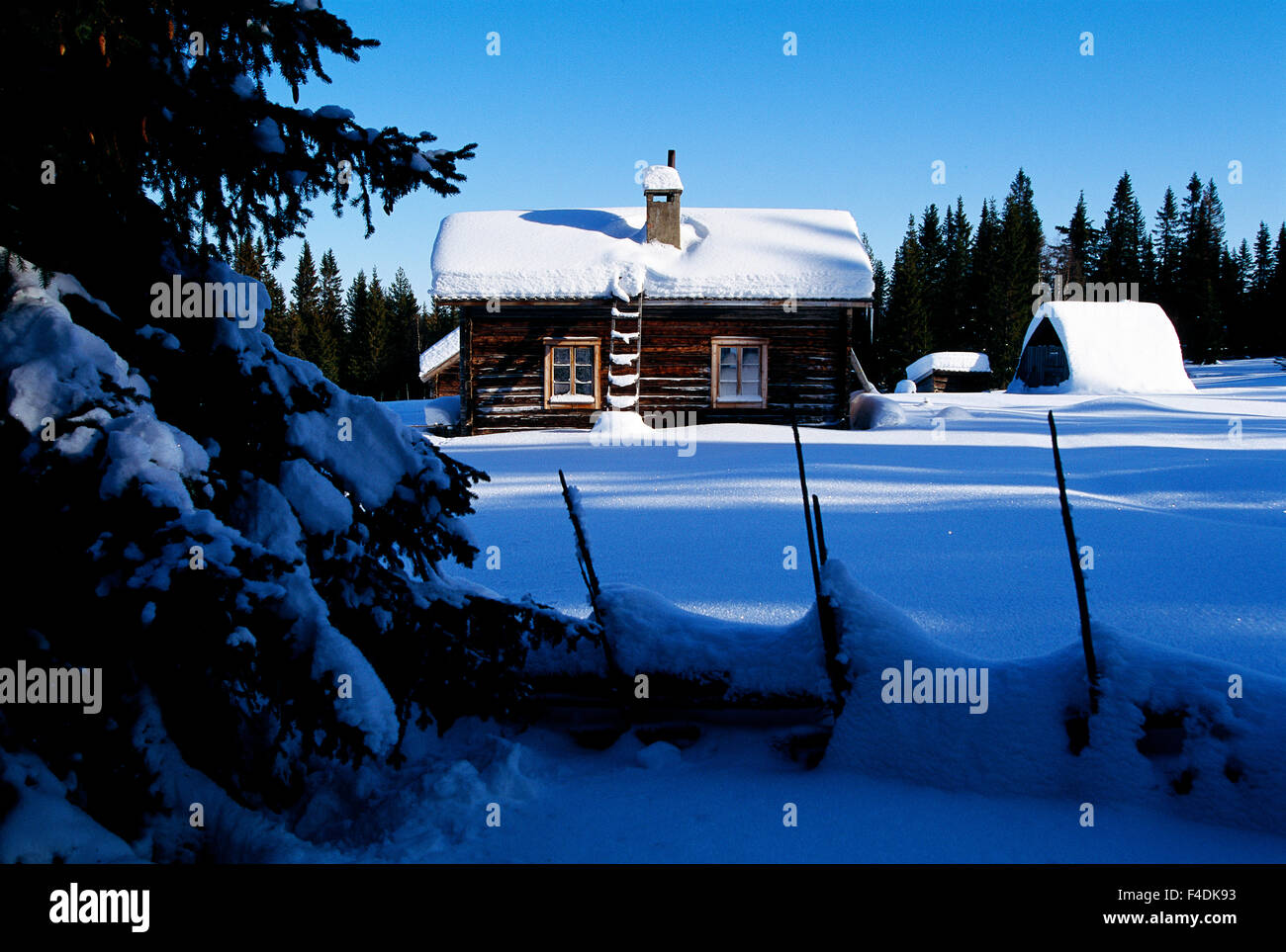 A shack in a winter landscape Stock Photo - Alamy