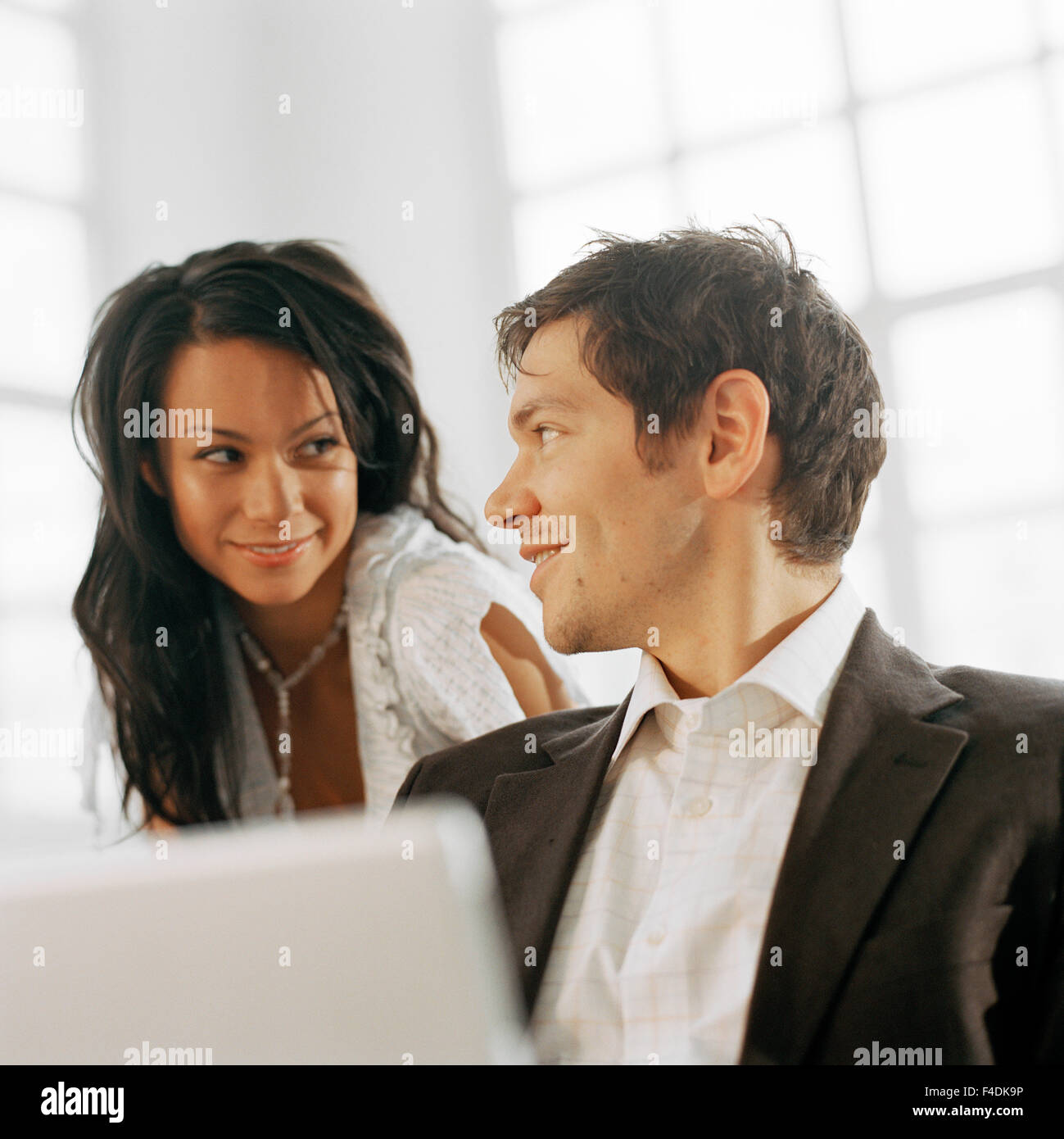 Couple having eyecontact, Sweden Stock Photo - Alamy