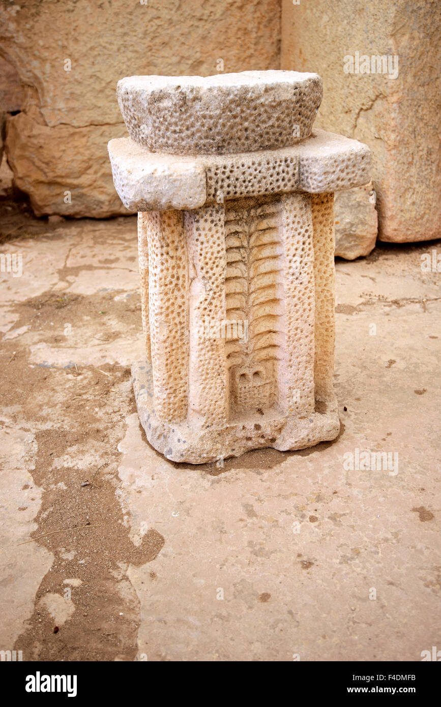 A possible carved altar etched with stars and a palm leaf at Hagar Qim ...