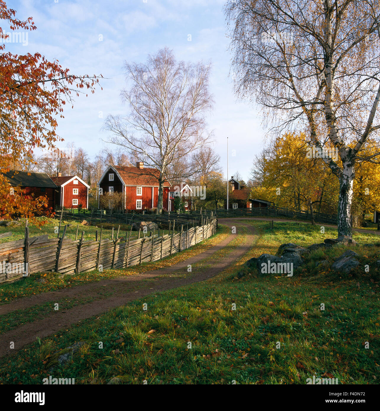 Red houses in the countryside Stock Photo - Alamy
