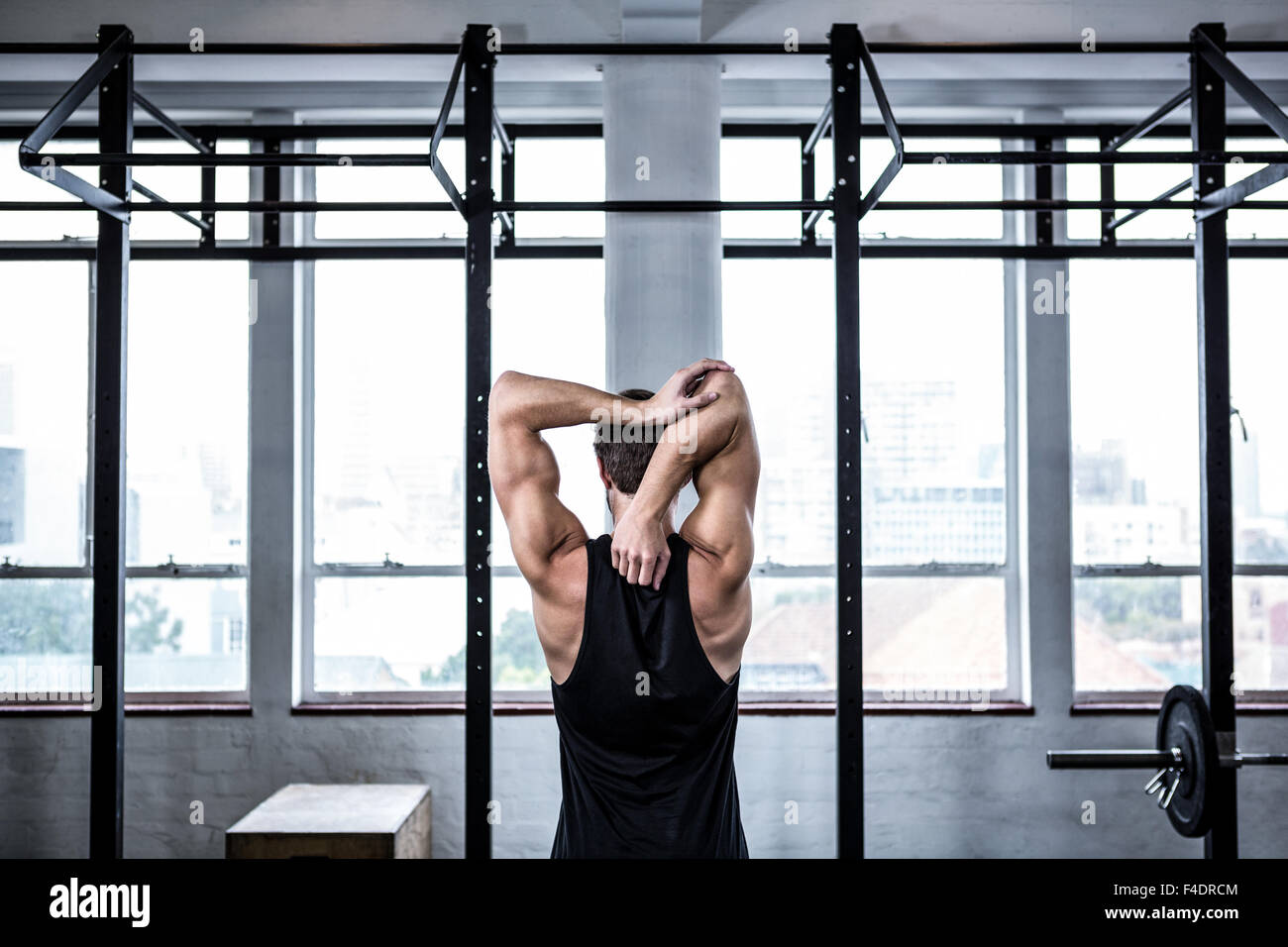 Fit man stretching his arms Stock Photo - Alamy