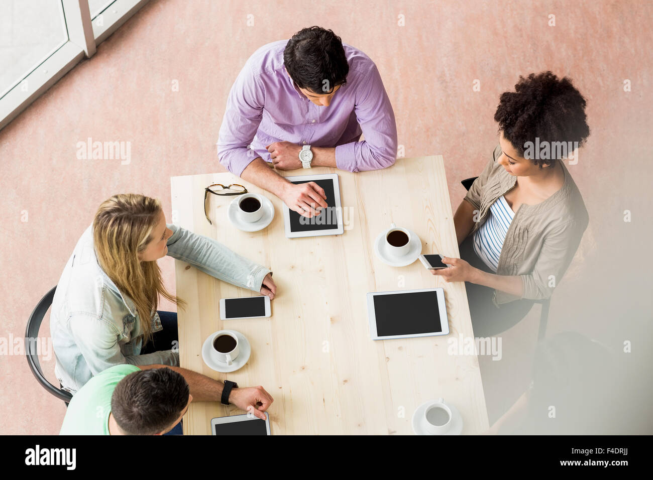 Students working together on an assignment Stock Photo - Alamy