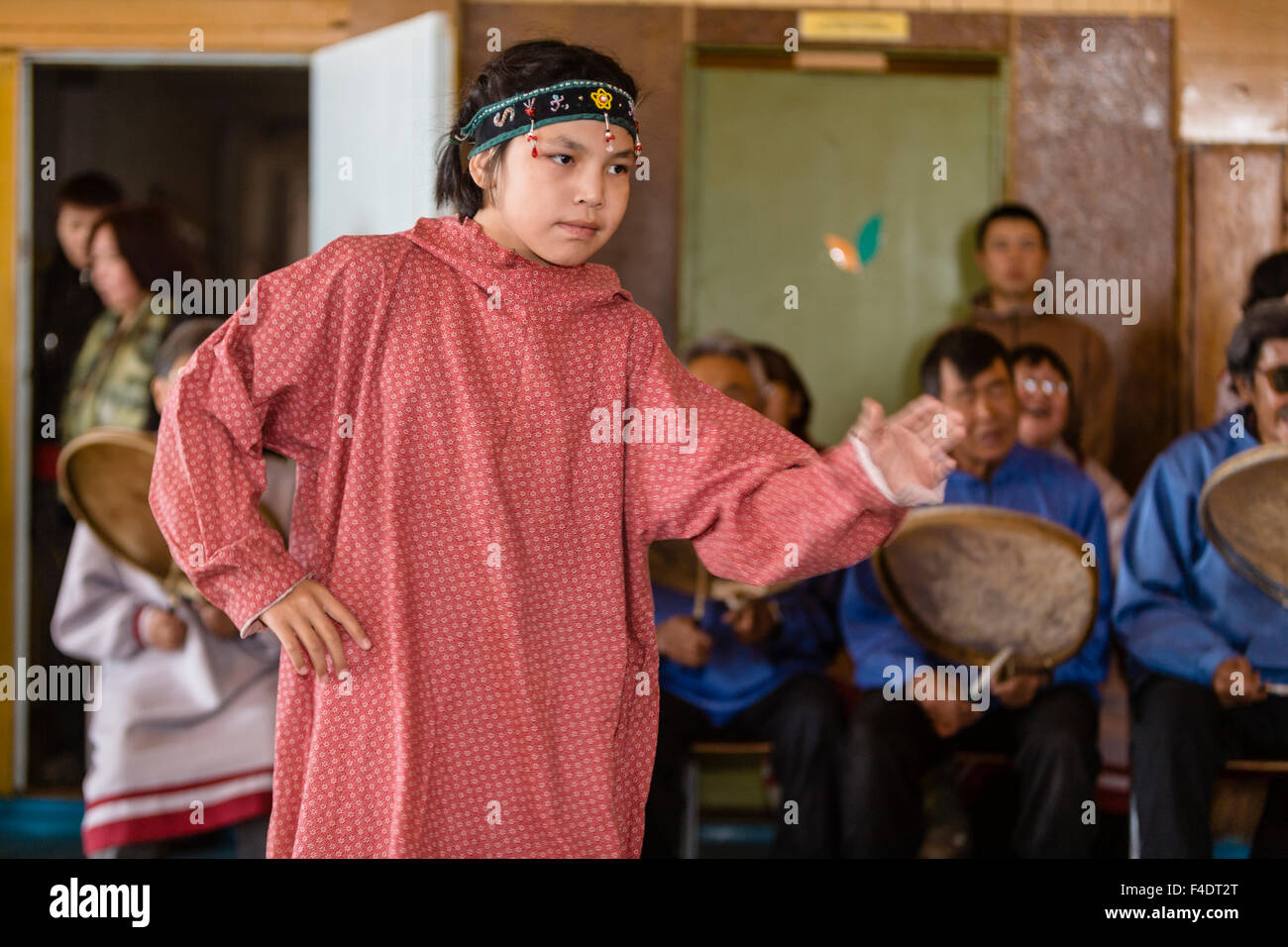 Russia, Chukotka, Chaplino Village, Chukchi girl performing traditional ...