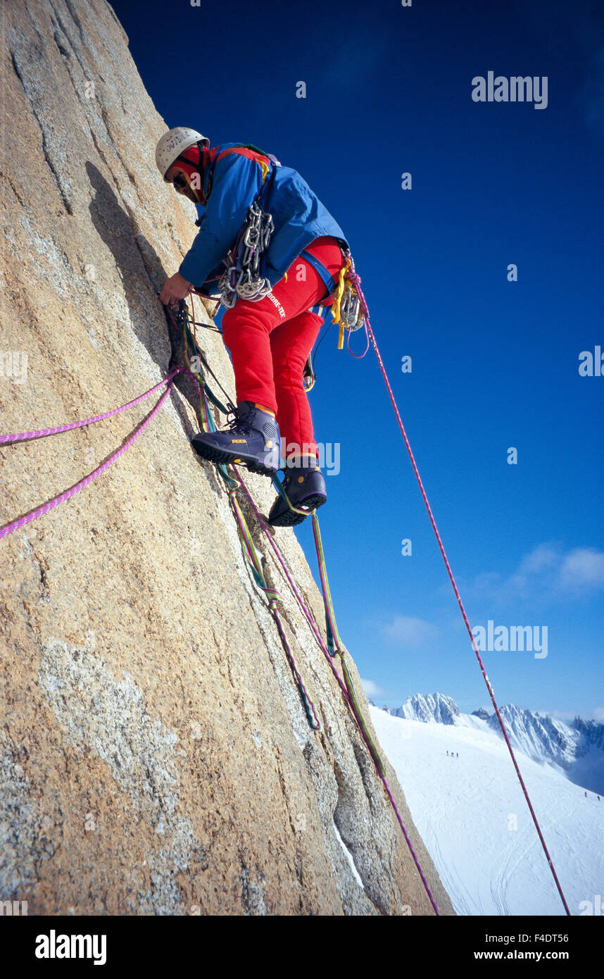 Climbing on a cliff face Stock Photo - Alamy