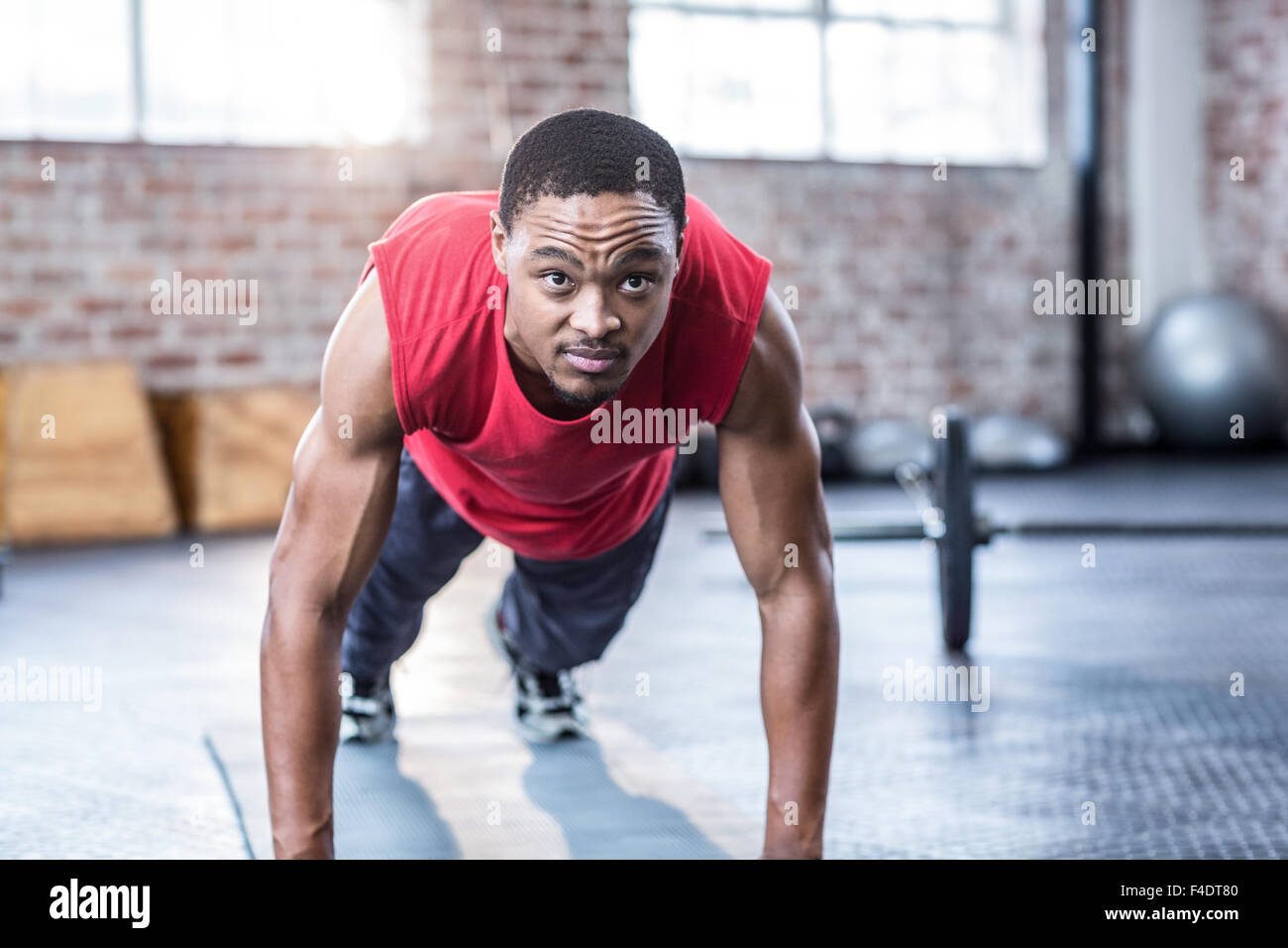 Muscular man doing push ups Stock Photo - Alamy