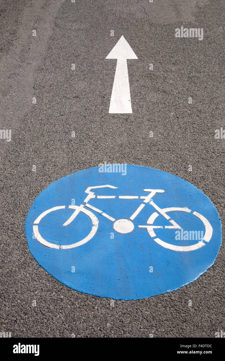 Bike Lane Sign on Pavement Stock Photo - Alamy