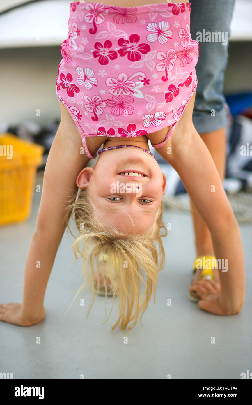 Girl doing handstand hi-res stock photography and images - Alamy