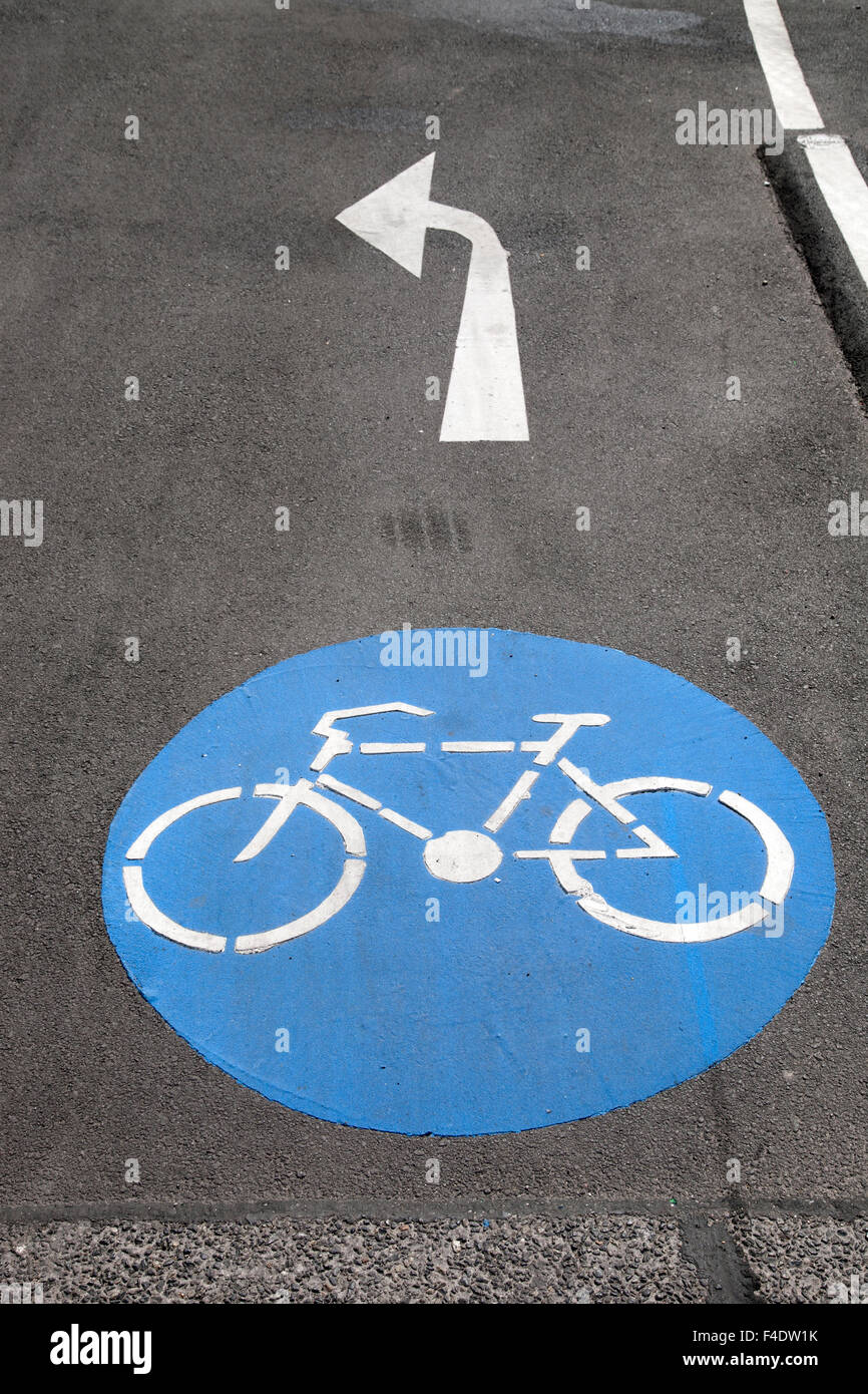 Bike Lane Sign on Pavement Stock Photo - Alamy