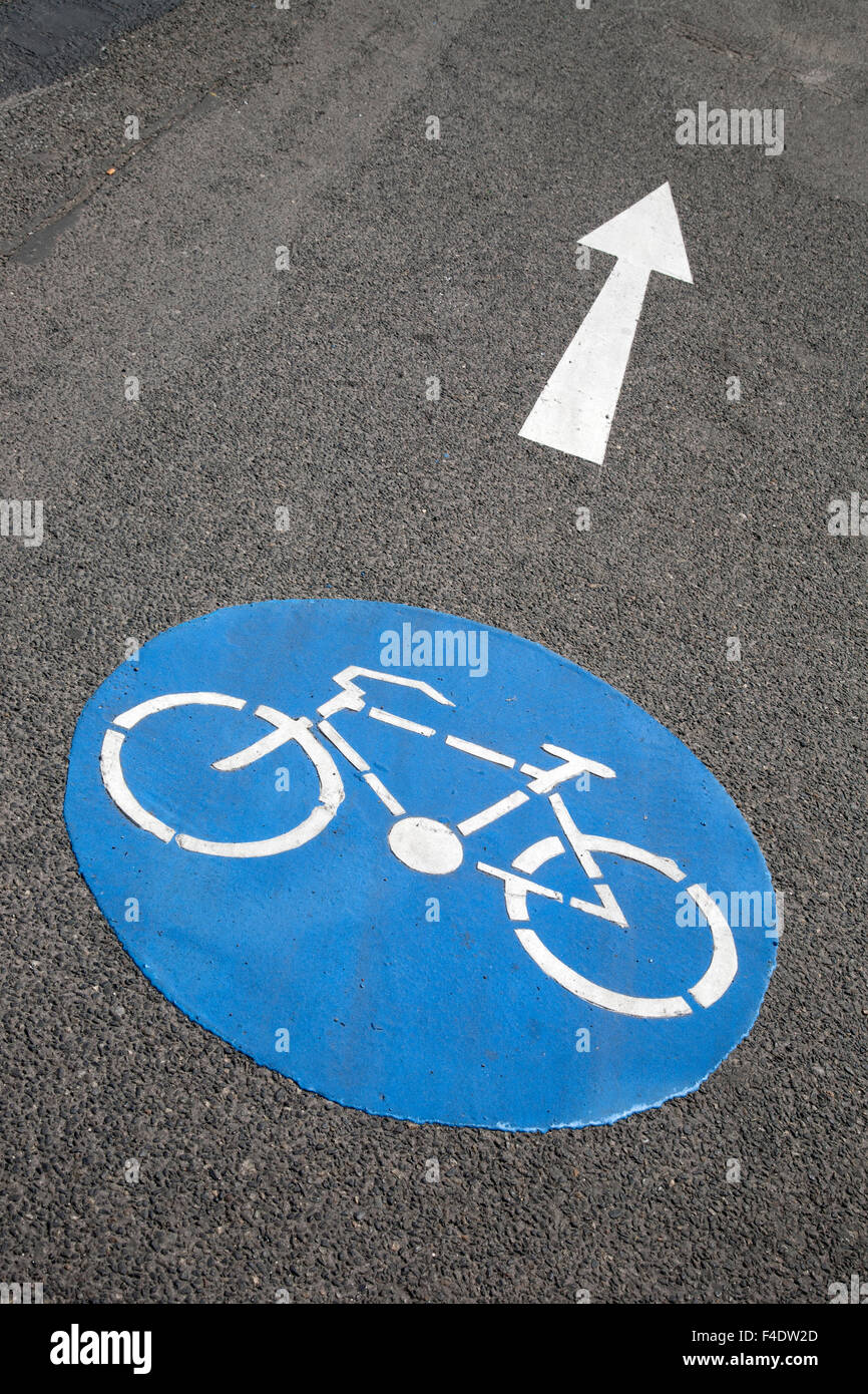 Bike Lane Sign on Pavement Stock Photo - Alamy