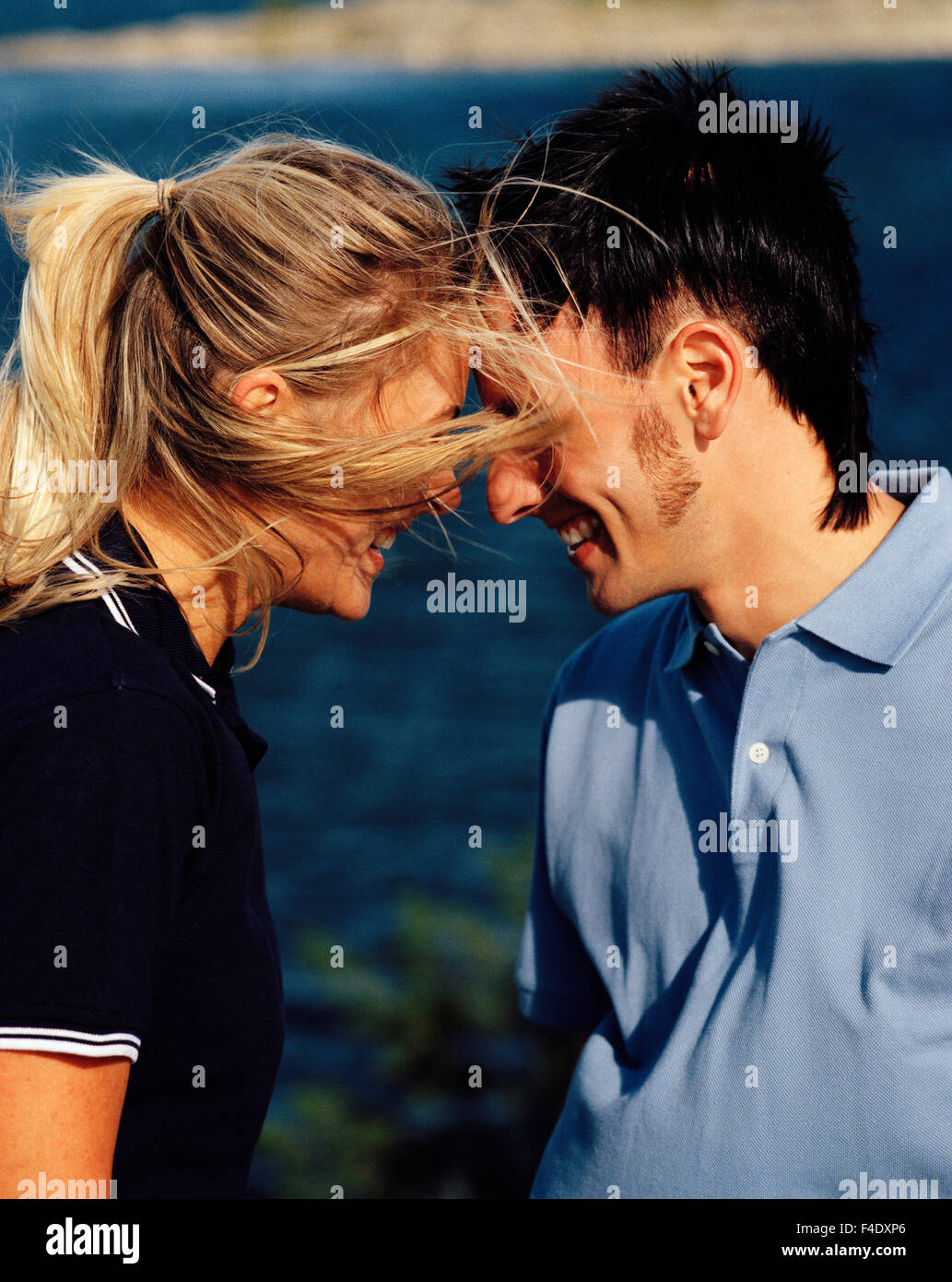 Two People Foreheads Touching Stock Photos & Two People Foreheads ...