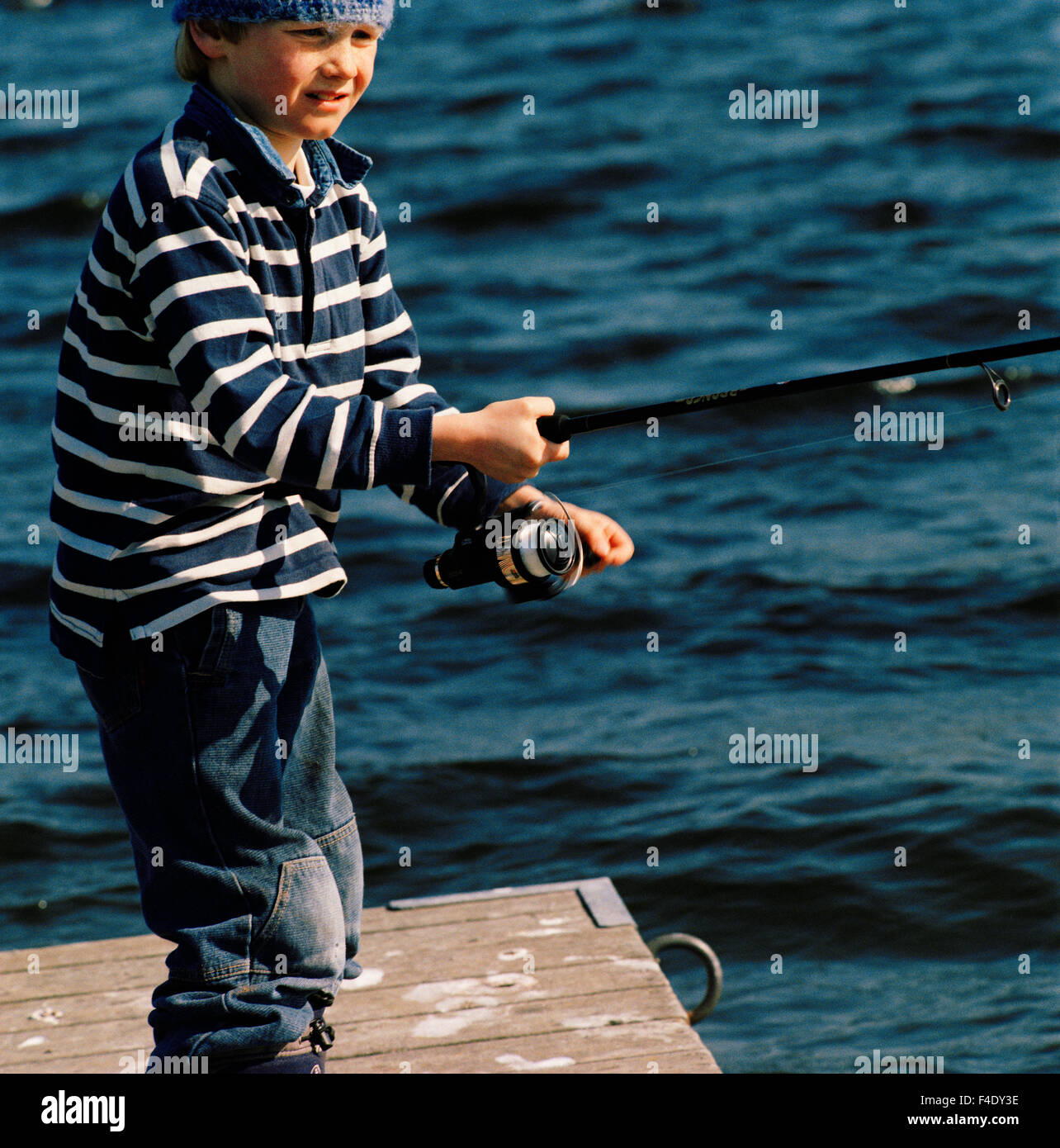 Stockholm archipelago boy fishing hi-res stock photography and images ...