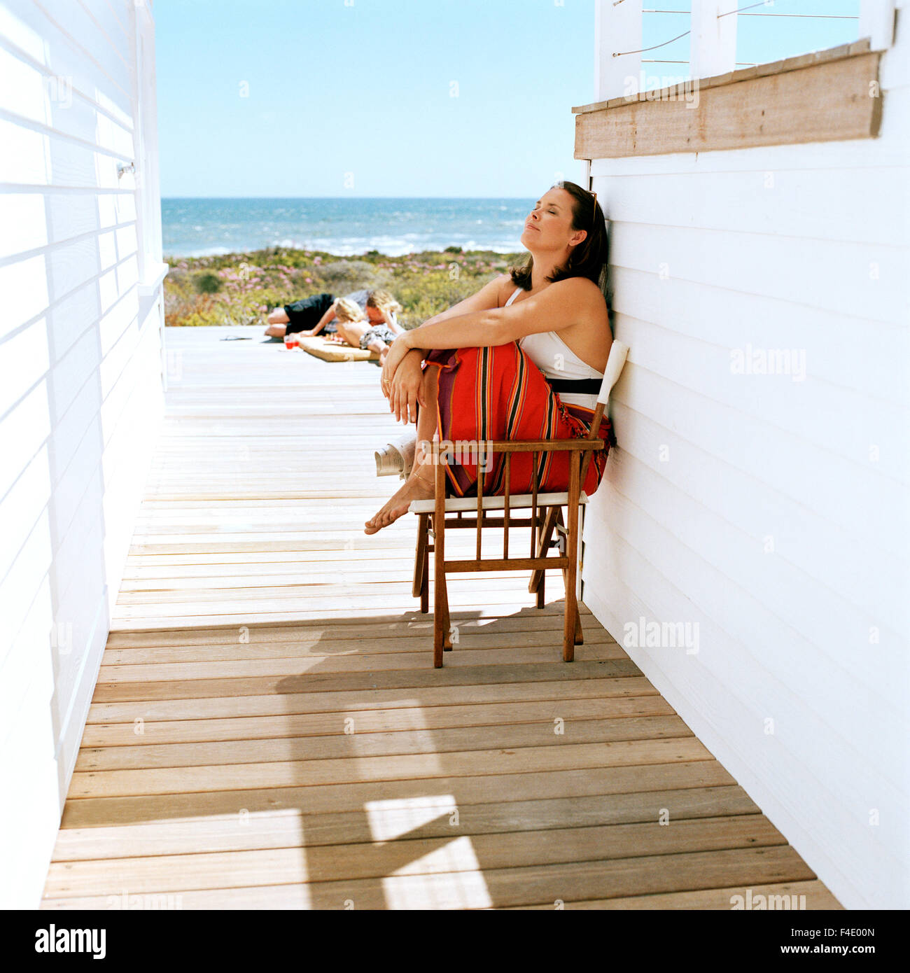 Woman on veranda High Resolution Stock Photography and Images - Alamy