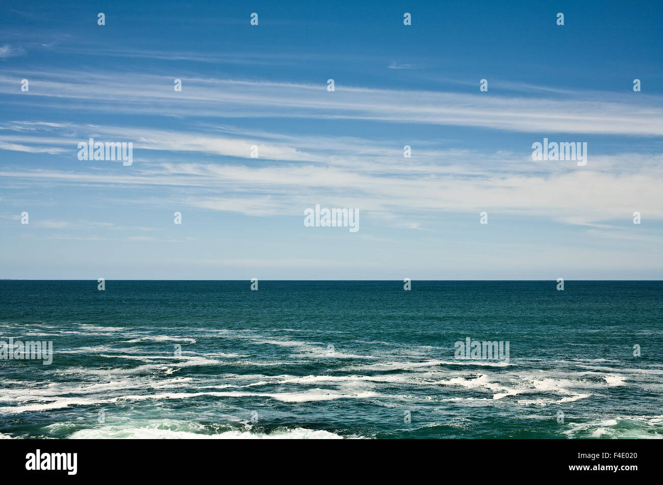 Blue sky over the ocean Stock Photo - Alamy