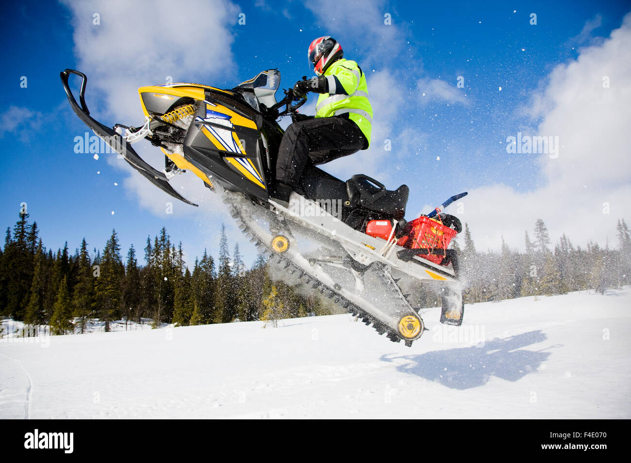 A person on a snowmobile, Sweden Stock Photo - Alamy