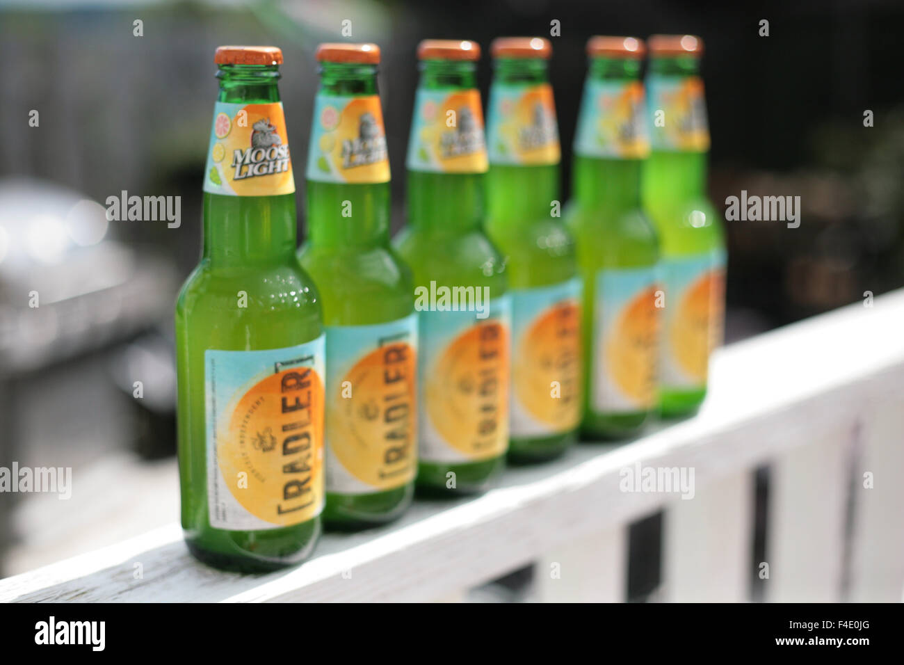 Bottles of Moosehead Radler lined up on a sunny day in Nova Scotia ...