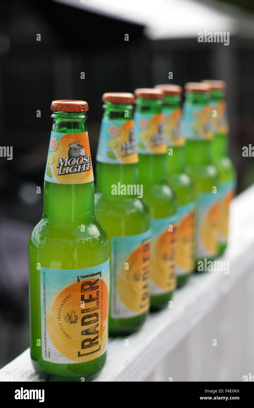 Bottles of Moosehead Radler lined up on a sunny day in Nova Scotia ...