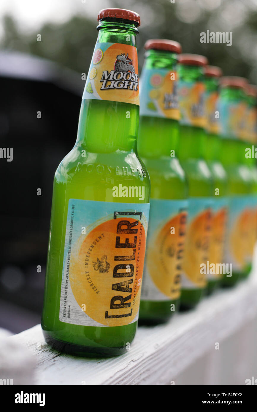 Bottles of Moosehead Radler lined up on a sunny day in Nova Scotia ...