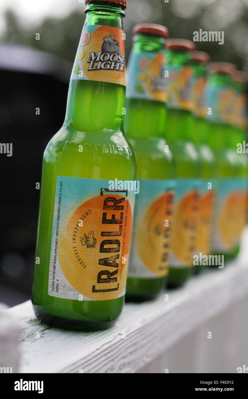 Bottles of Moosehead Radler lined up on a sunny day in Nova Scotia ...