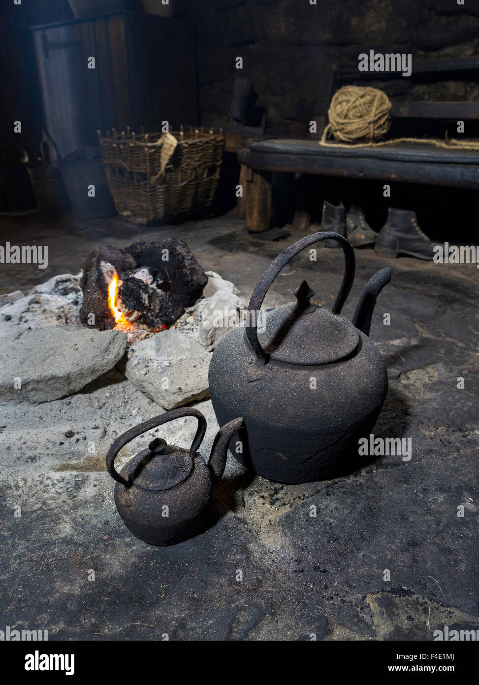 Arnol Blackhouse No 42 on the Isle of Lewis. Open peat fire in the living room, kitchen. (Large ...