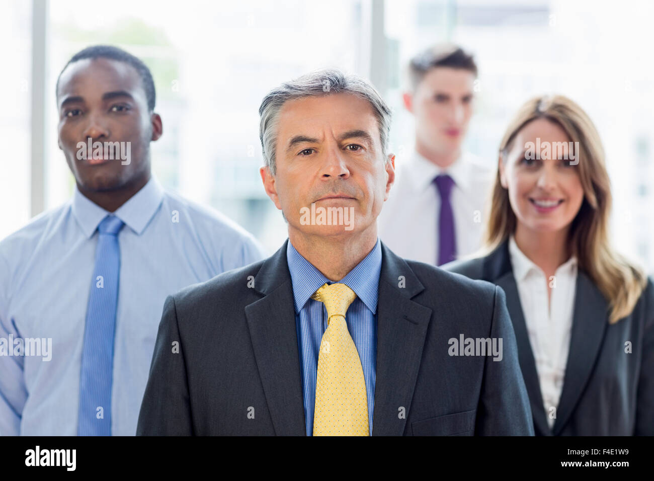 Business smiling people posing together Stock Photo - Alamy