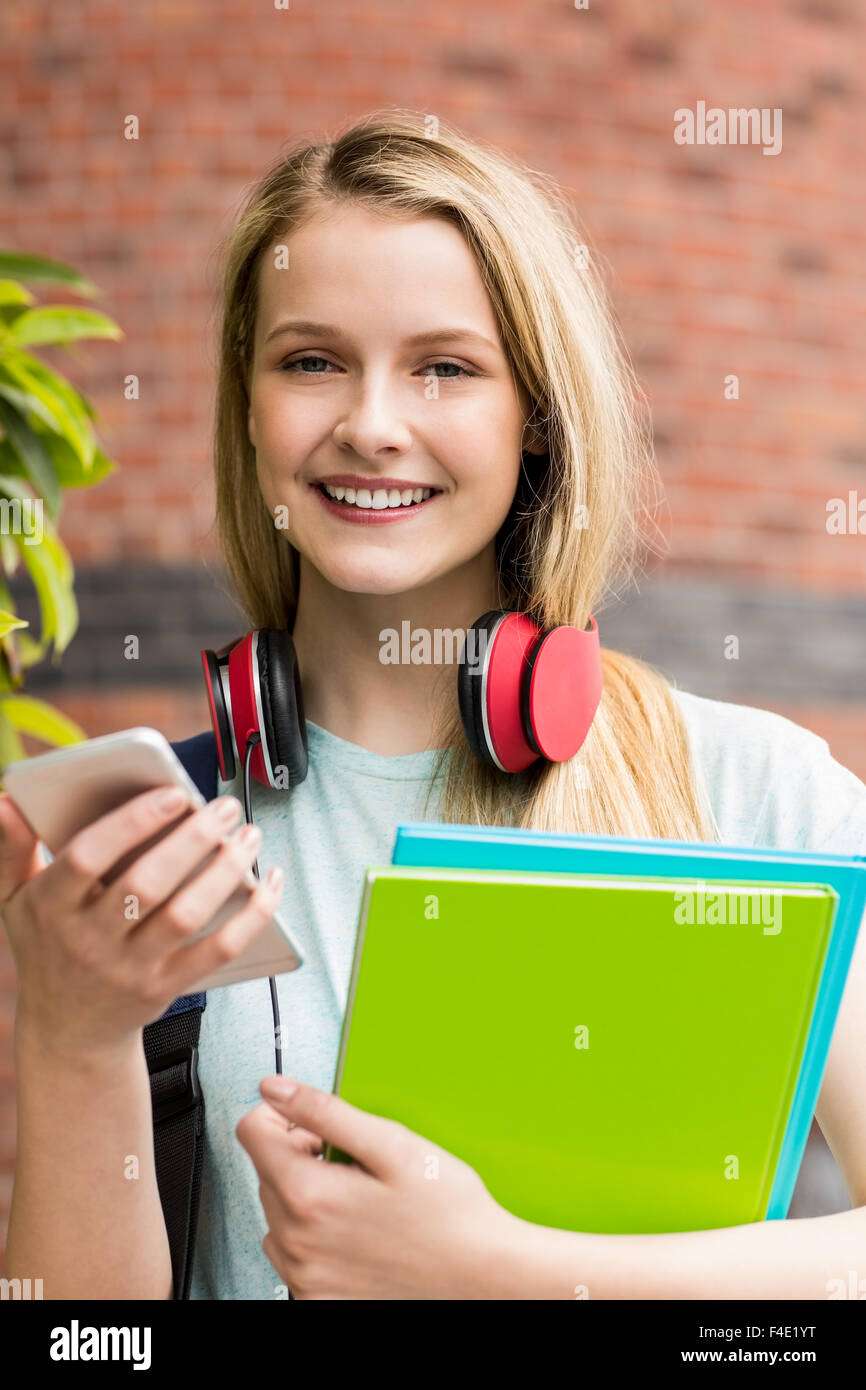 Student sending a text message Stock Photo - Alamy