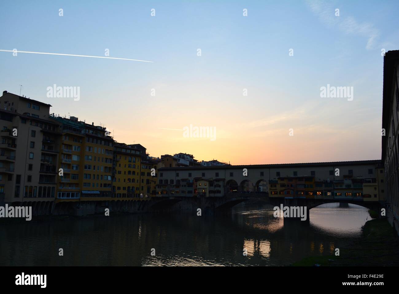 Ponte vecchio in Florence at sunset Stock Photo - Alamy