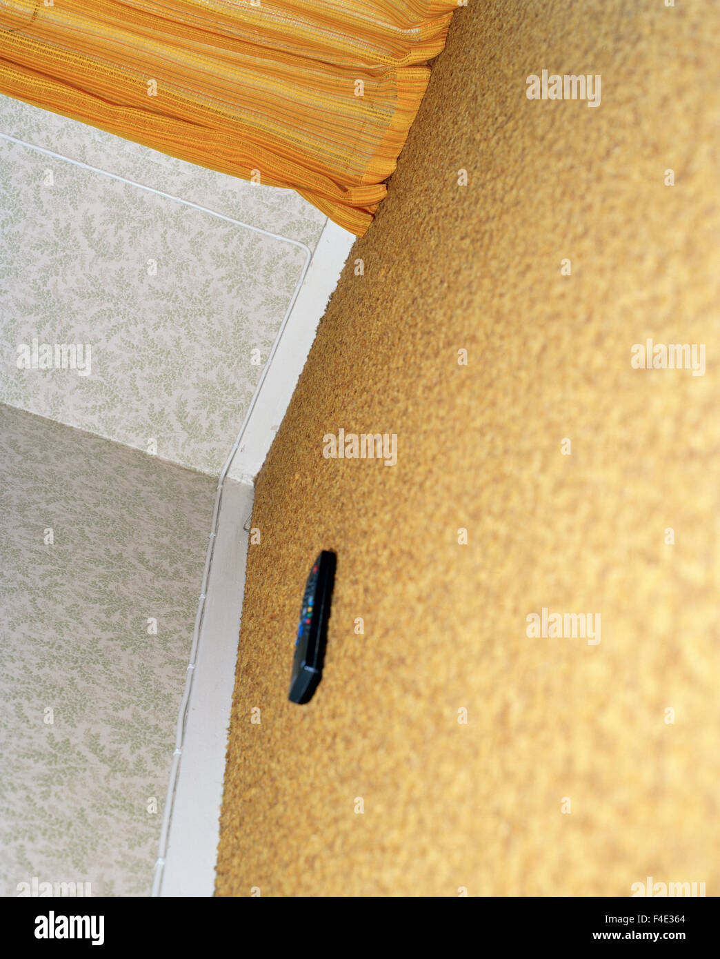 A remote control on the floor Stock Photo - Alamy
