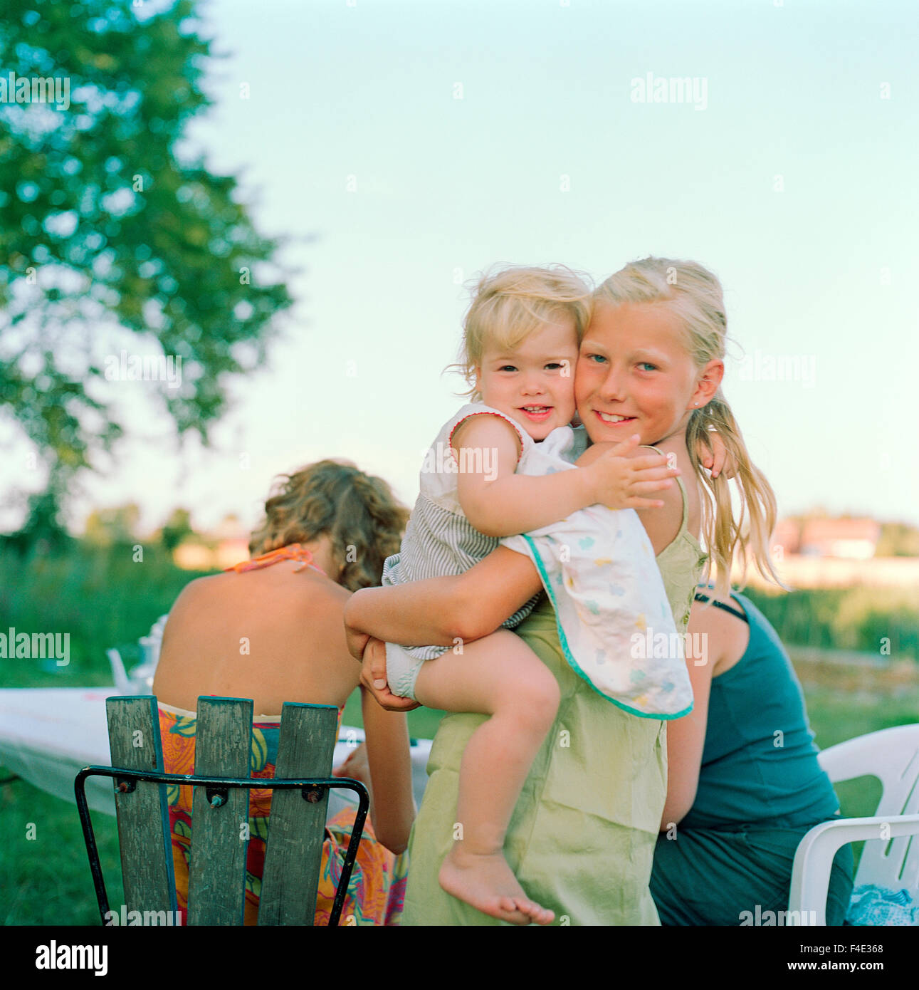 Children hugging, Sweden Stock Photo - Alamy