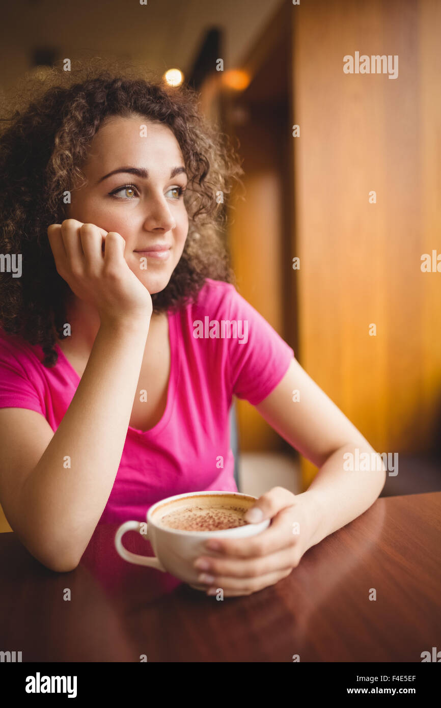 Pretty student having a coffee Stock Photo - Alamy