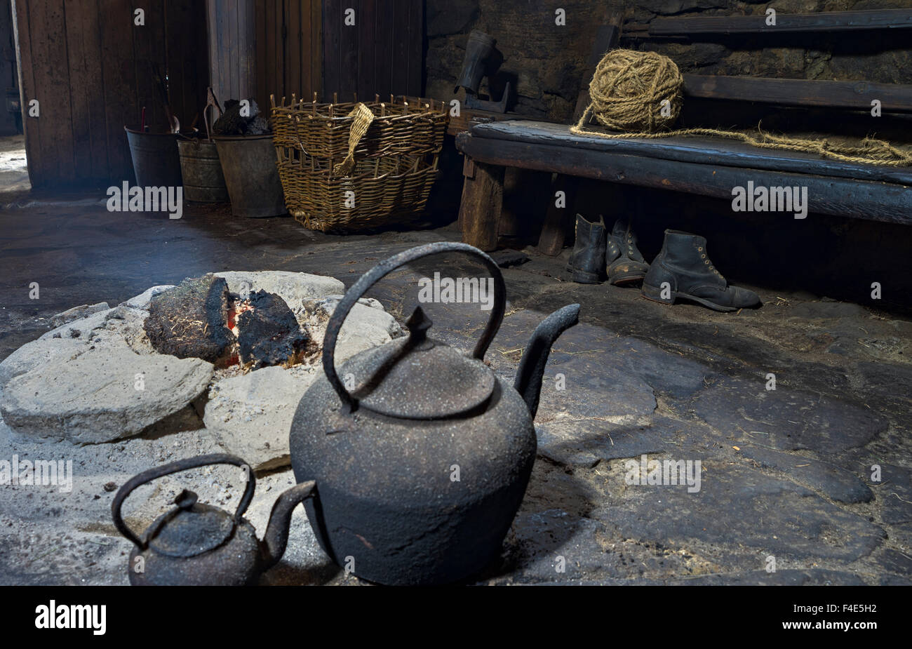 Arnol Blackhouse No 42 on the Isle of Lewis. Open peat fire in the living room, kitchen. (Large ...