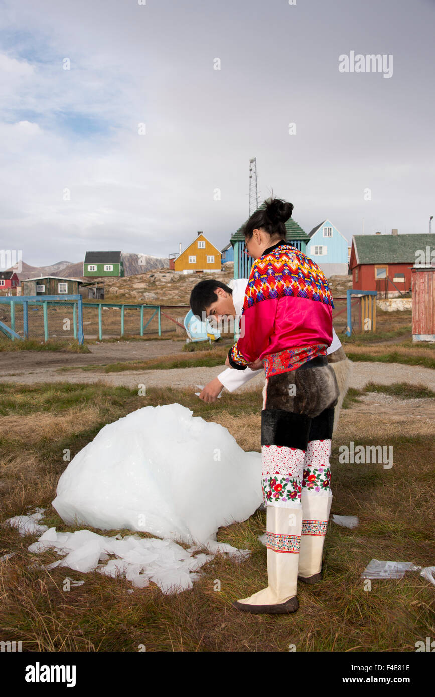 Greenland, Disko Bay, Saqqaq. Couple, in traditional Greenlandic attire ...