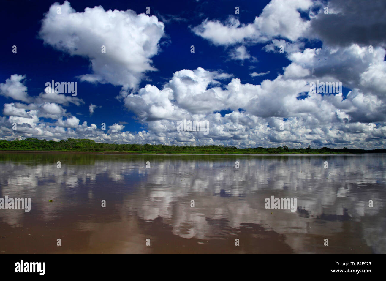 South America, Peru, Amazon. Cloud reflections on Amazon river Stock ...
